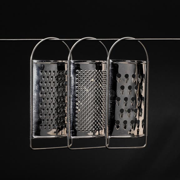 Trio of kitchen rasps stock image. Image of reflection - 301589