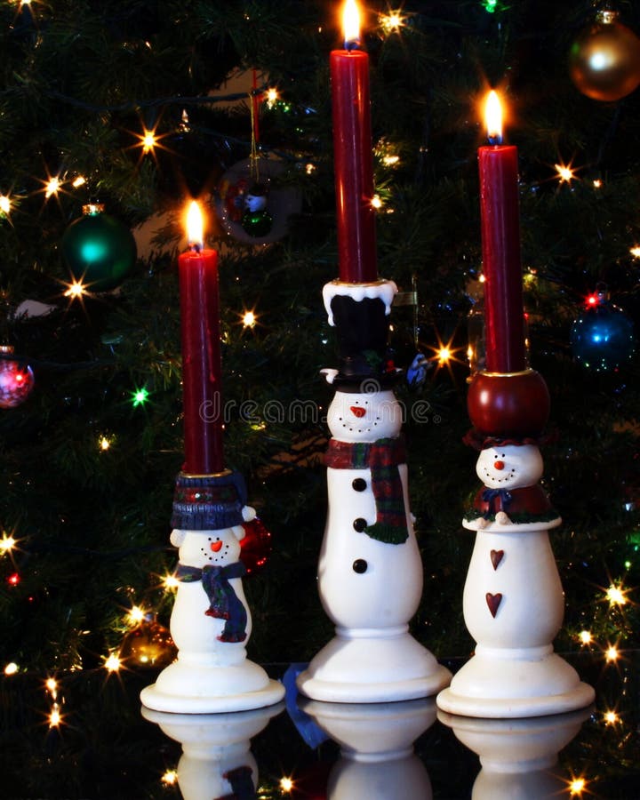 A Trio of Snowman Candles stock photo. Image of beautiful - 7556618