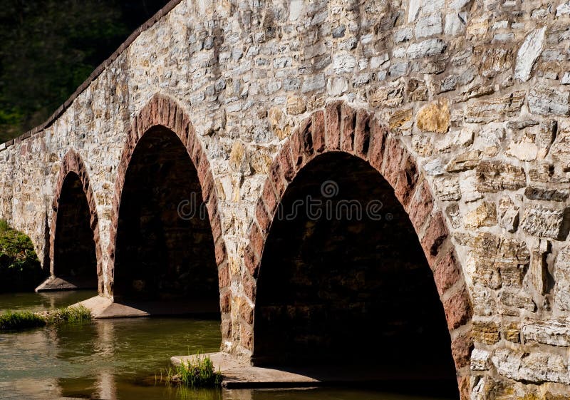 Triple arch stone bridge stock image. Image of arched - 46842077
