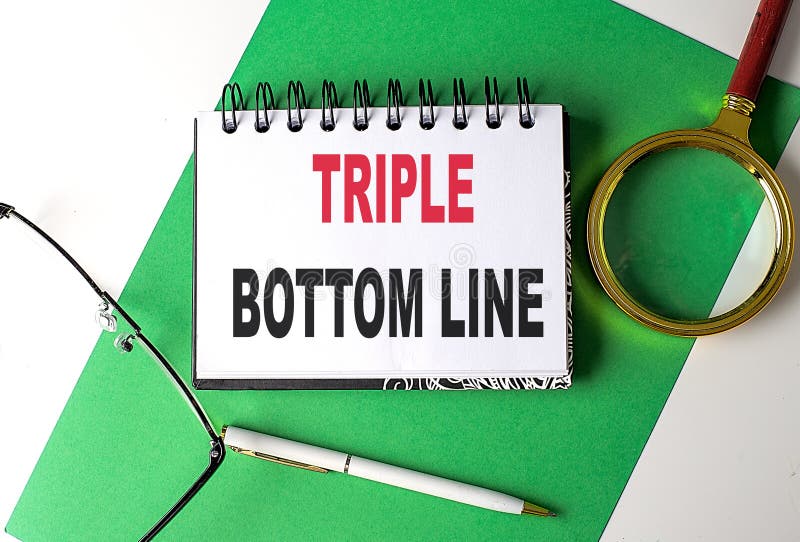 TRIPLE BOTTOM LINE Text on Notebook on Green Paper Stock Photo - Image ...