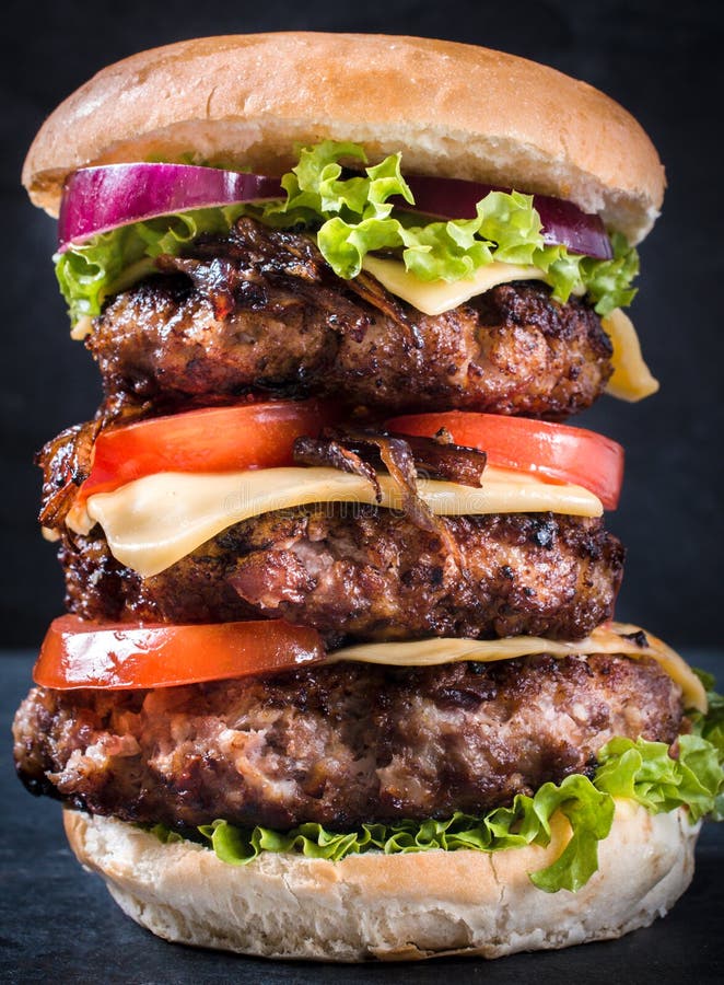Triple hamburger stock photo. Image of objects, meal - 28431868