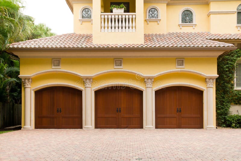 Three door car garage stock image. Image of door, garage - 5528413