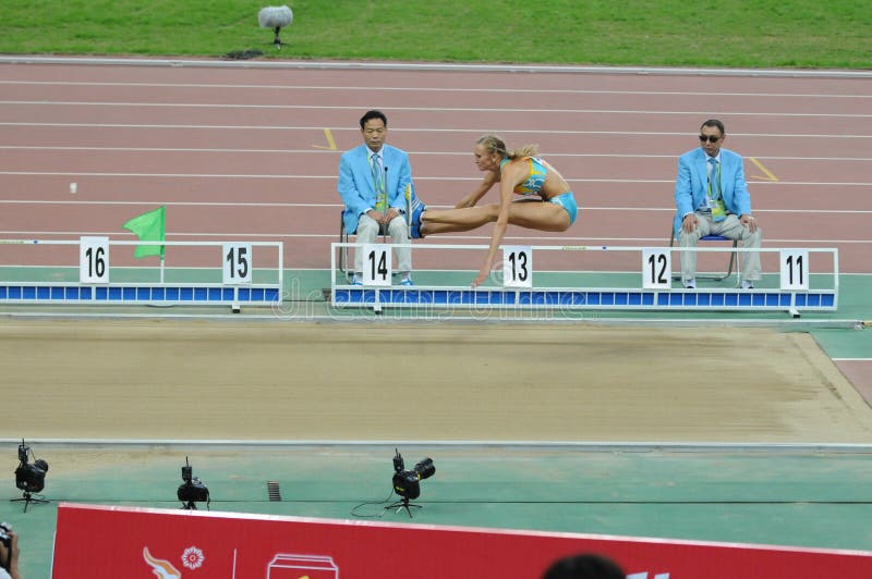 Triple jump editorial stock image. Image of running, gold - 17249334