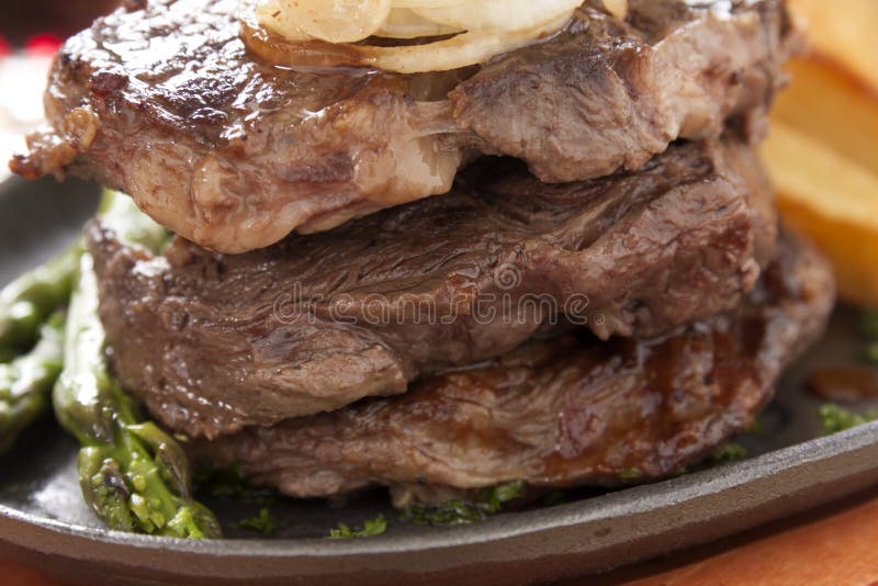 Triple Steaks stock photo. Image of cooked, stack, steaks - 31320474