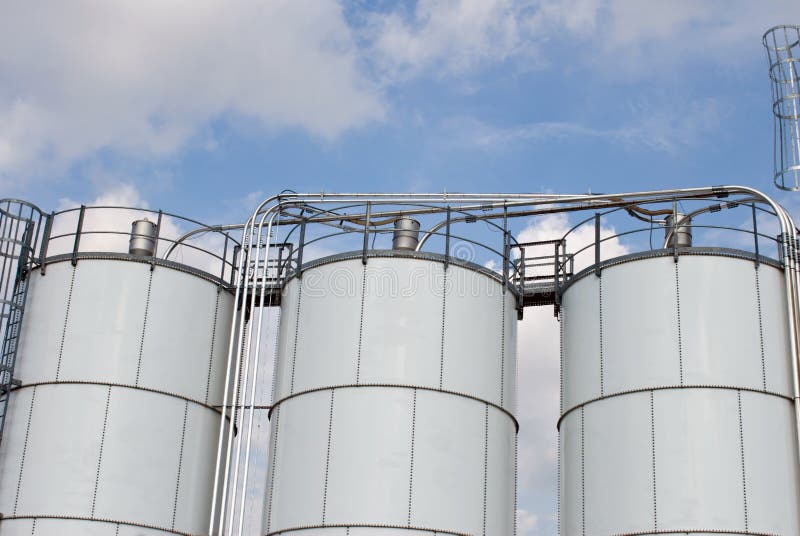 Triple Tanks stock image. Image of environment, blue, atmosphere - 6395225