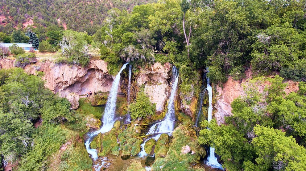 Triple Waterfall Over Mossy Rocks in Forest Stock Photo - Image of ...