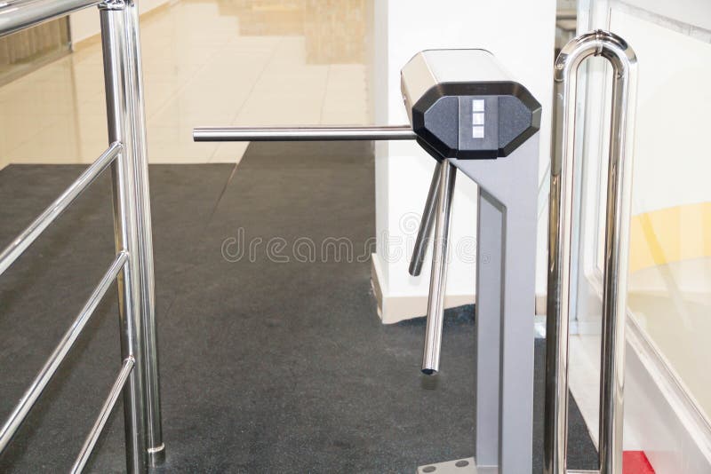 The Tripod Turnstile with Electronic Card Reader is Closed. of a ...