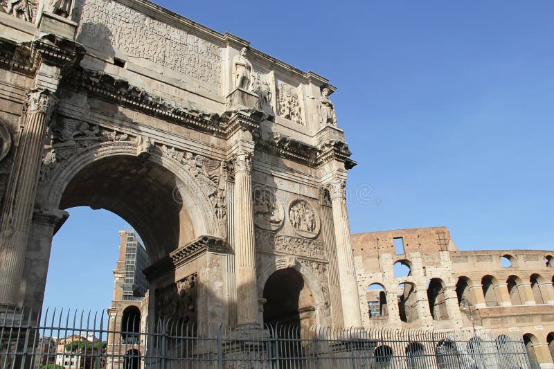 Triumphal or Constantine Arch and the Colosseum in Rome, Italy Stock ...
