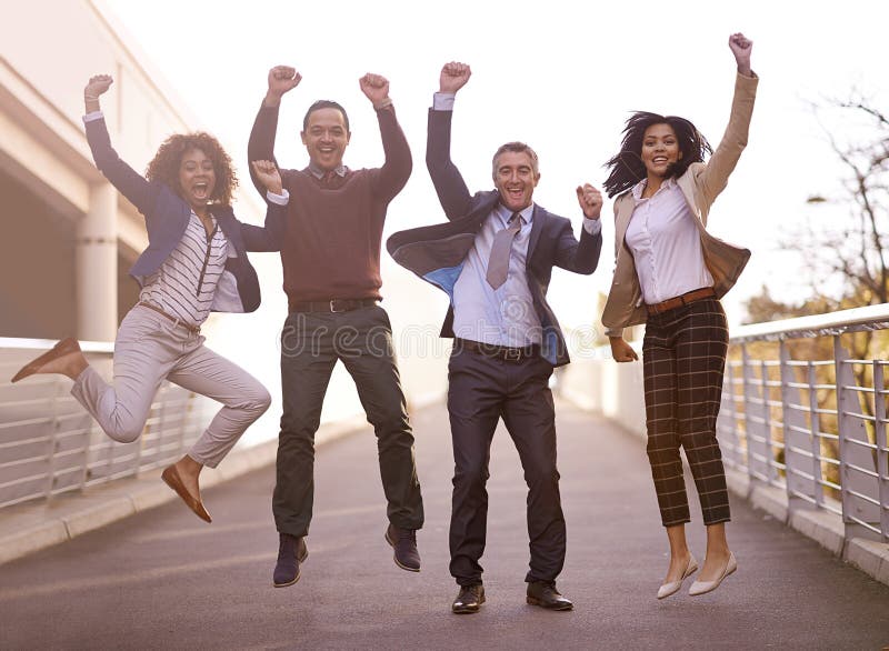 The Triumphant Team. a Group of Businesspeople Jumping with Excitement ...