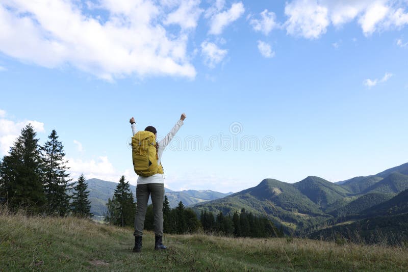Triumphant Tourist on Top of Mountain, Back View. Space for Text Stock ...