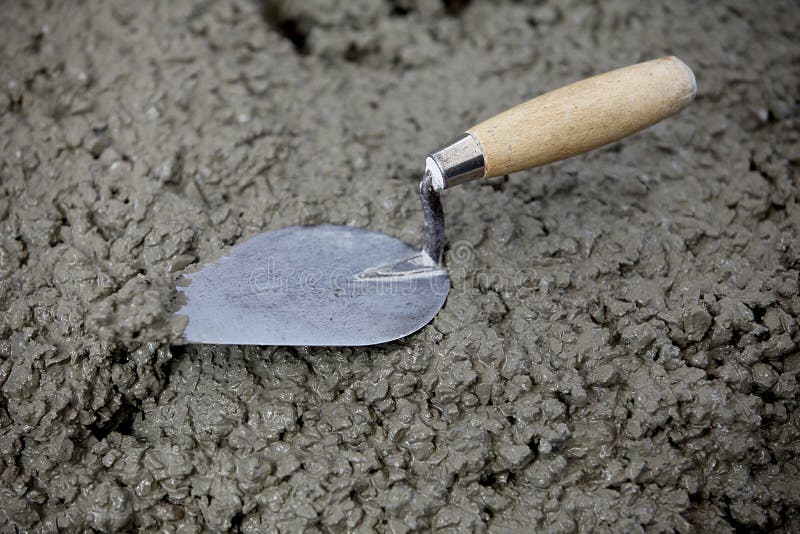 Troffel en cement stock foto. Image of bouw, handel, hulpmiddelen ...