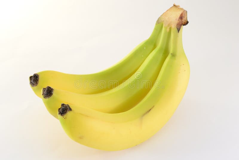 Trois Bananes Se Situent Dans Trois Chaises Longues, Sur Un Fond Bleu ...