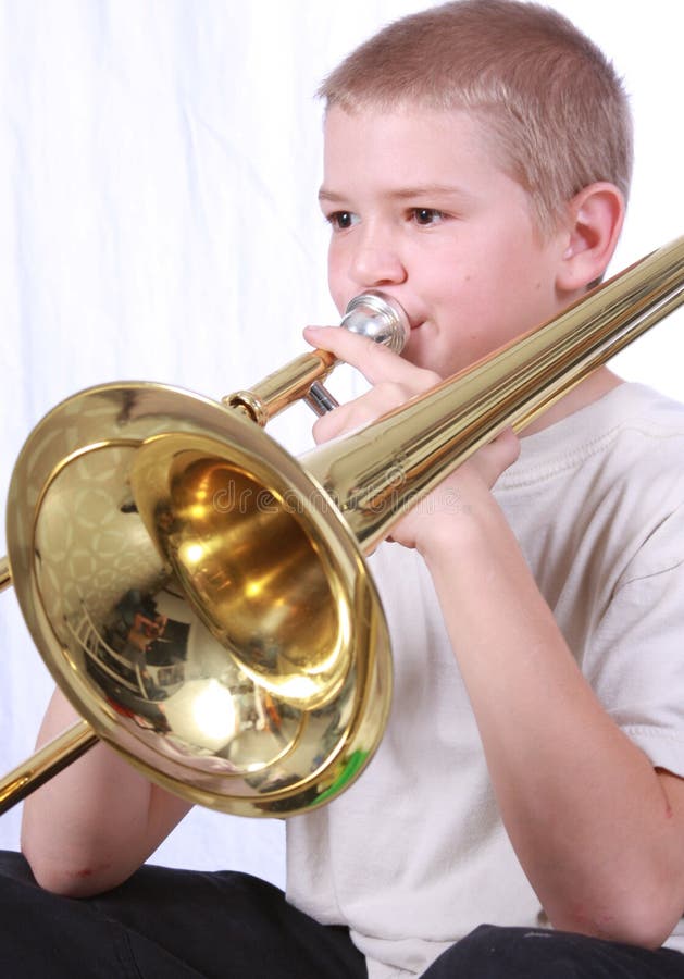 Trombone player 6 stock photo. Image of children, lesson - 6873160