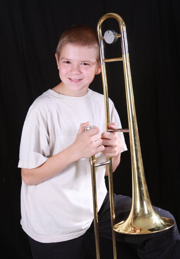 Trombone player 6 stock photo. Image of children, lesson - 6873160