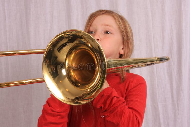 Trombone player 6 stock photo. Image of children, lesson - 6873160