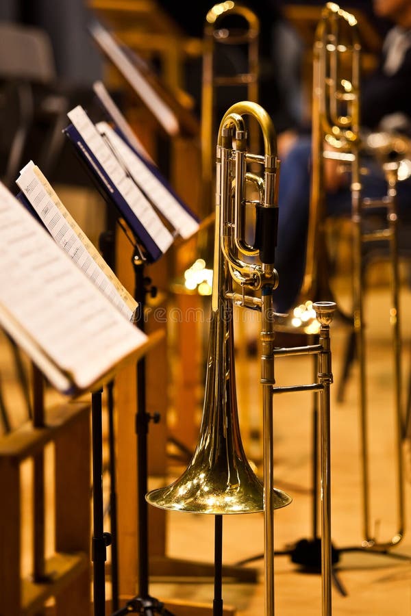 Trombones Standing on Stage Stock Image - Image of performer, skill ...