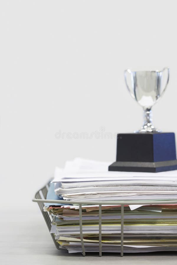 Trophy on Stack of File Folders Stock Image - Image of data, isolated ...