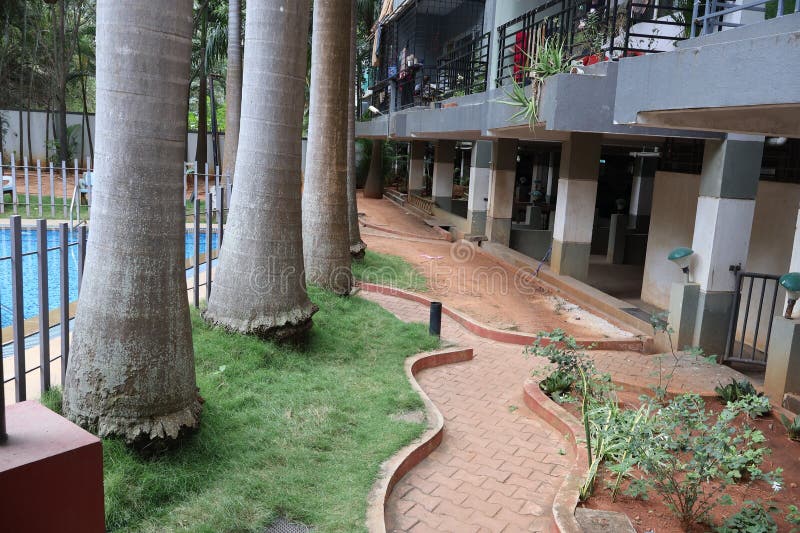 Tropical Apartment Complex with Landscaped Walking Path Stock Image ...
