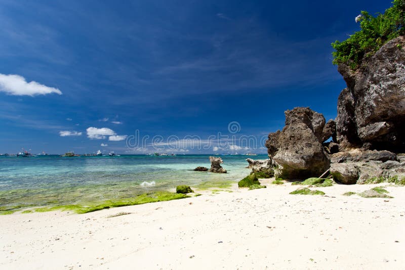 Tropical beach with rocks stock photo. Image of caribbean - 29318550