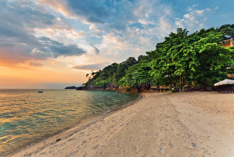 Tropical beach at sunset. stock photo. Image of ocean - 93702698