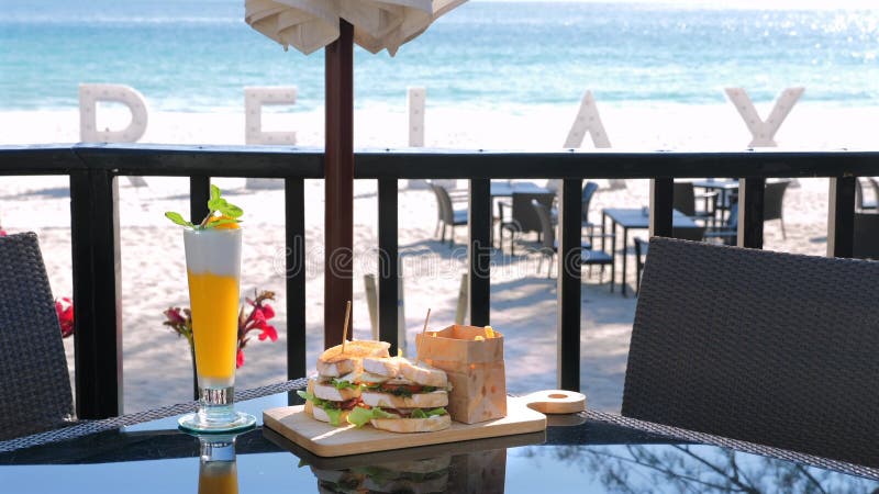 Tropical Beachfront Dining Experience Featuring Refreshing Stock ...