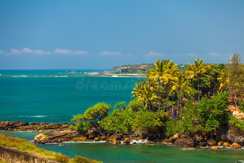 Tropical coast line stock photo. Image of rock, cliff - 66427460