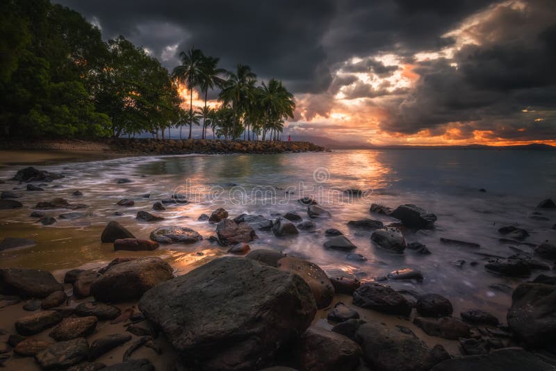 Tropical coastal sunset stock photo. Image of wave, australia - 84703680