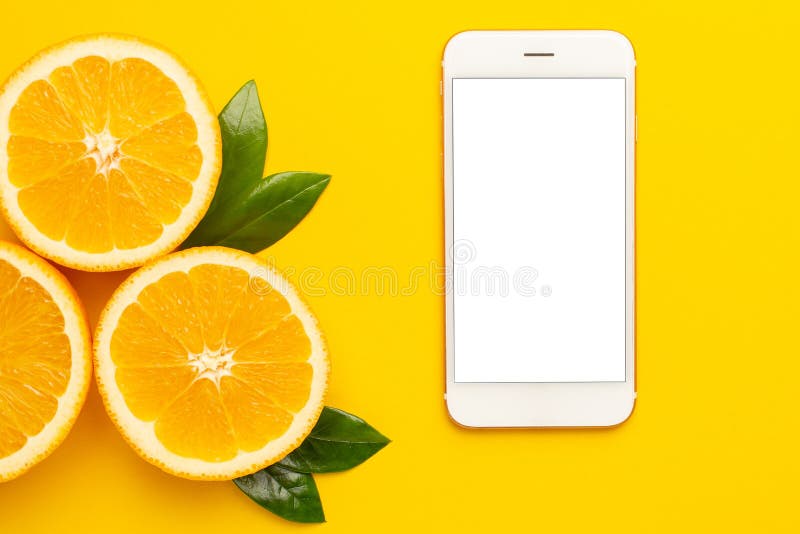 Tropical Cutting Citrus Lemon and Mobile Phone on Yellow Background ...