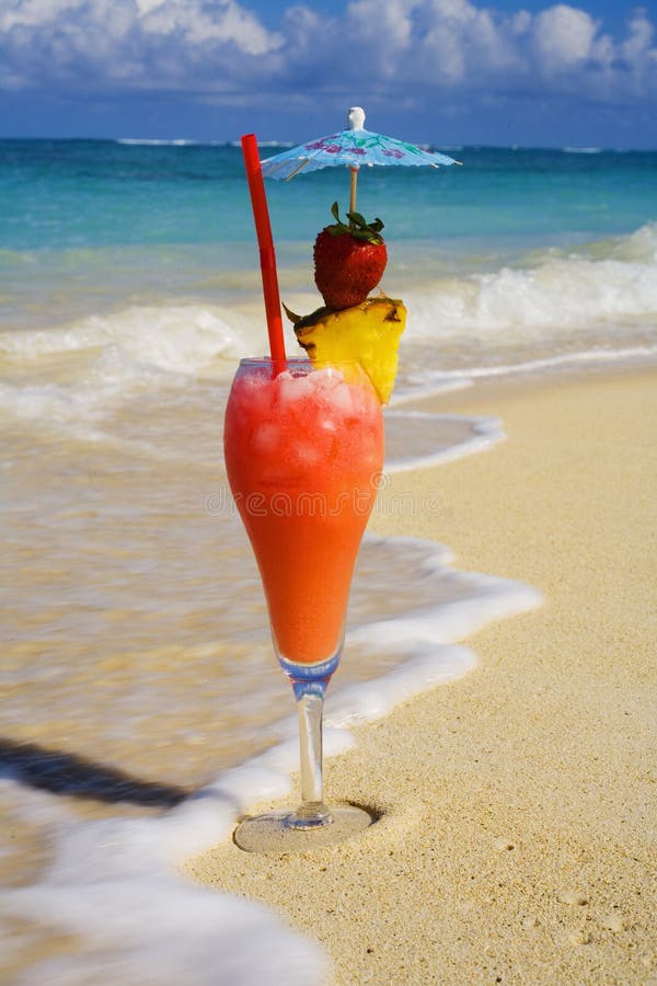 A Tropical Drink on a Hawaiian Beach Stock Image - Image of sand, guava ...