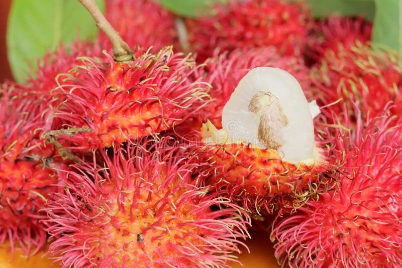 Rambutan Fruit with Delicious Core on Wooden Table Stock Photo - Image ...