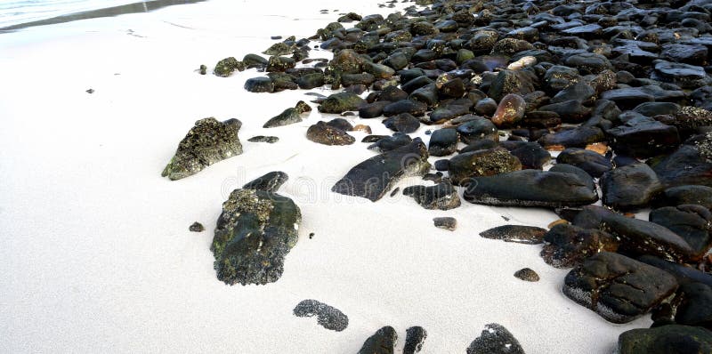 Tropical Landscape with Beautiful Black Rocks on Clear White Sandy ...