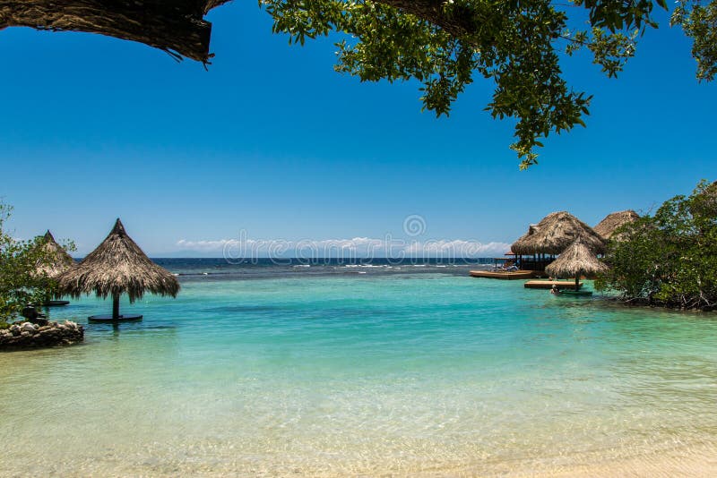 Tropical Oasis stock image. Image of island, bungalow - 108668041