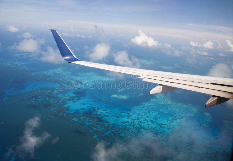 Tropical Ocean Over Plane Wing Stock Image - Image of tourism, travel ...