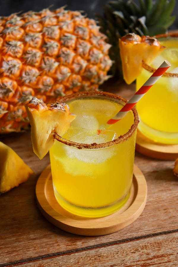 Tropical Pineapple Mocktail on Wooden Coasters Stock Photo - Image of ...