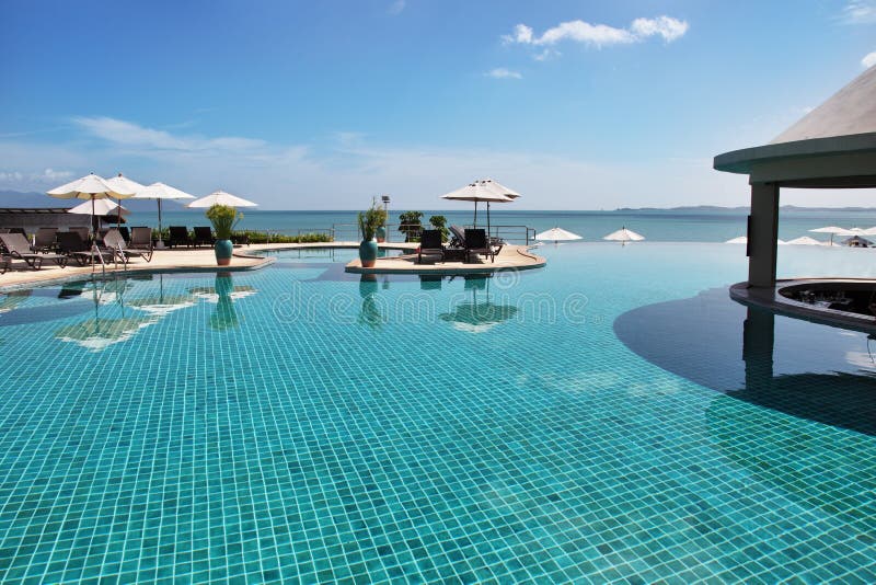 Tropical Resort. Poolside and Sea View Stock Image - Image of abstract ...