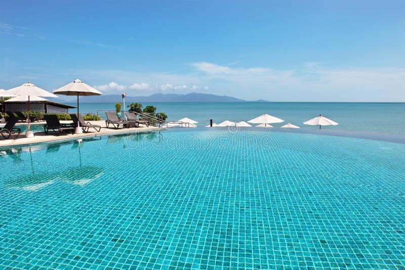 Tropical Resort. Poolside And A Sea View Picture. Image: 17372532