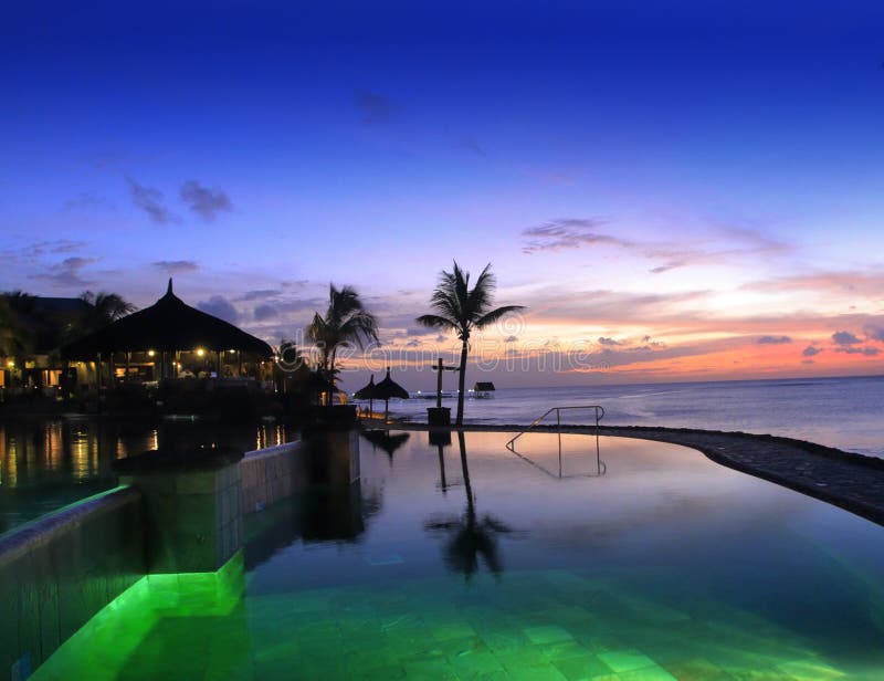 Tropical Resort on the Sunset Stock Photo - Image of outdoors, swimm ...
