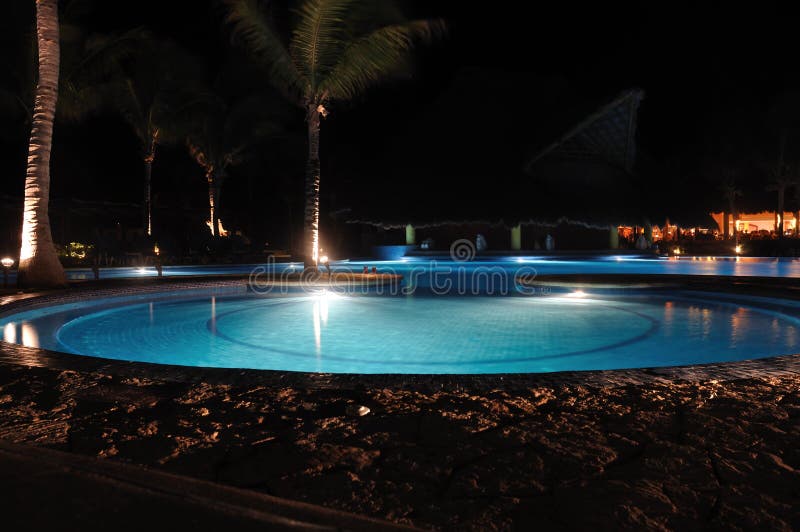 Tropical Resort Swimming Pool at Night Stock Photo - Image of resort ...