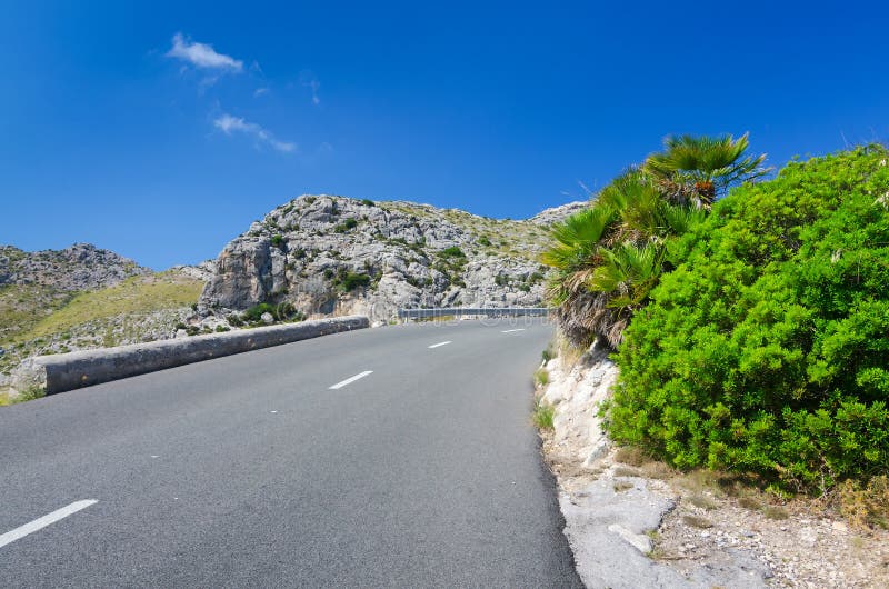 Tropical road curve stock image. Image of pollensa, island - 34195991