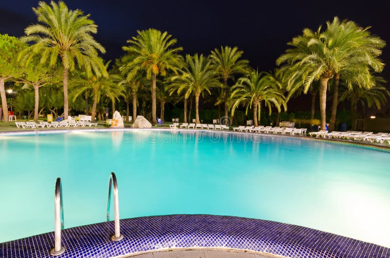 Tropical Swimming Pool in Night View Stock Photo - Image of cloud ...