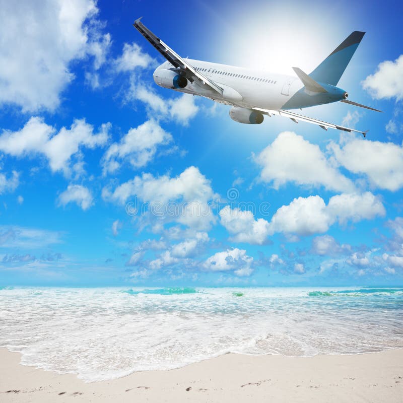 Jet Plane Over Tropical Island Stock Photo - Image of airplane ...