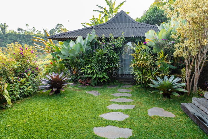 Tropical Villa Surrounded by Lush Greenery and Vibrant Exotic Plants Stock Image - Image of ...