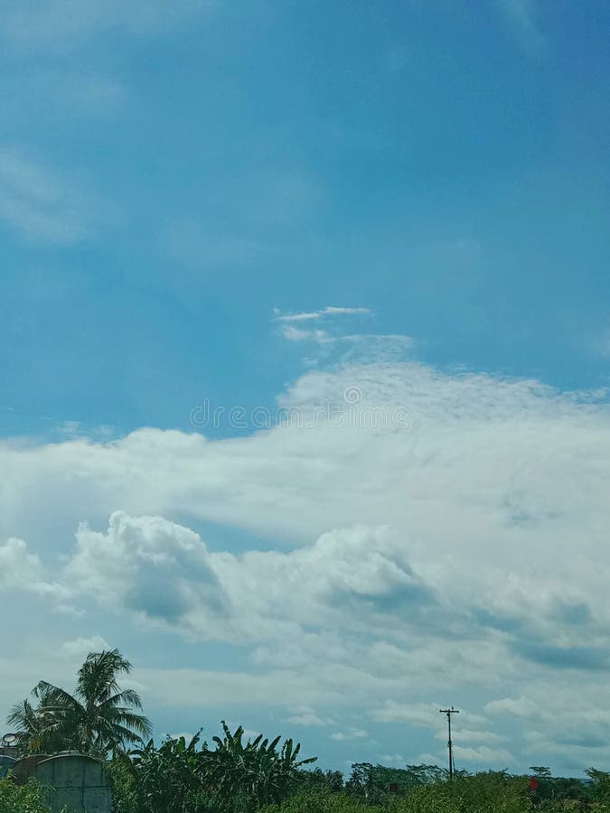 Tropical Weather and Sunny Clouds Stock Image - Image of plain, horizon ...