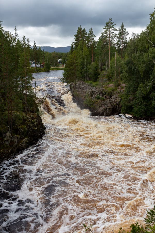 Troubled River with Dark Waters with Waterfall Stock Image - Image of ...
