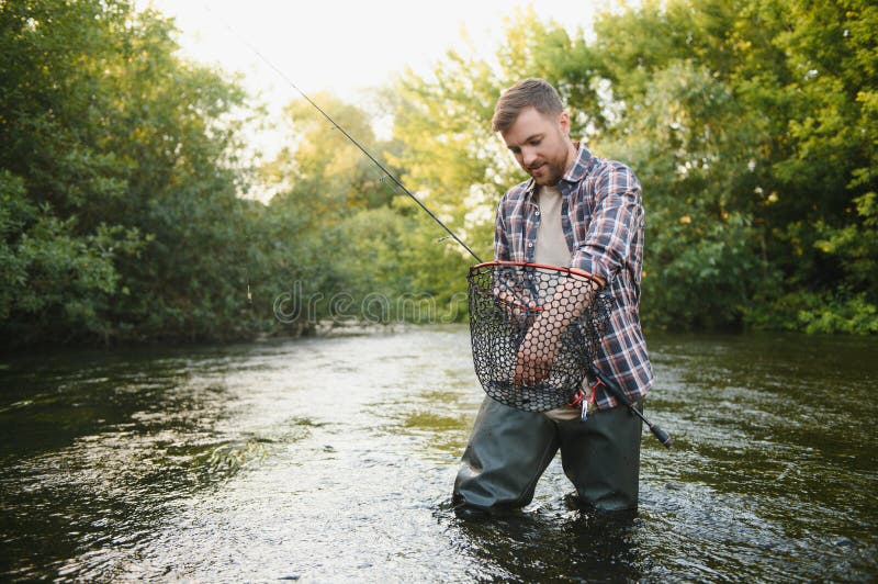 Trout Being Caught in Fishing Net. Stock Photo - Image of fisherman ...