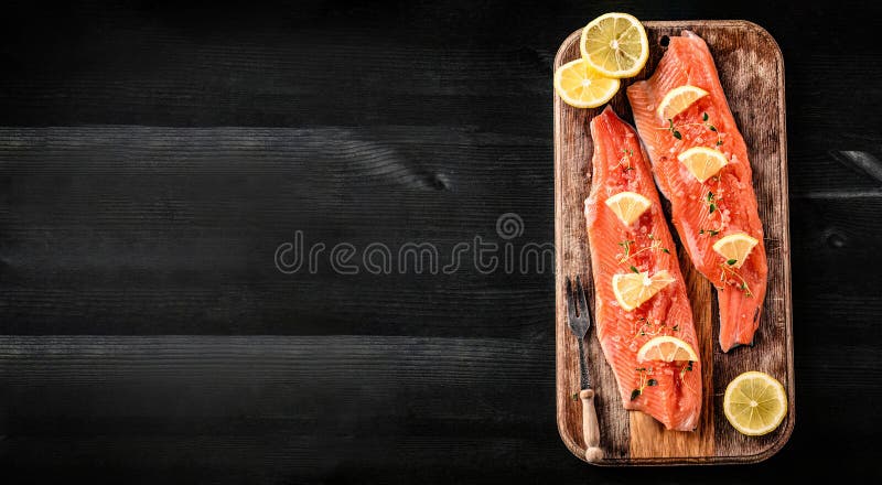Trout Fillet Red Fish with Lemon Ready for Cooking Stock Photo - Image ...