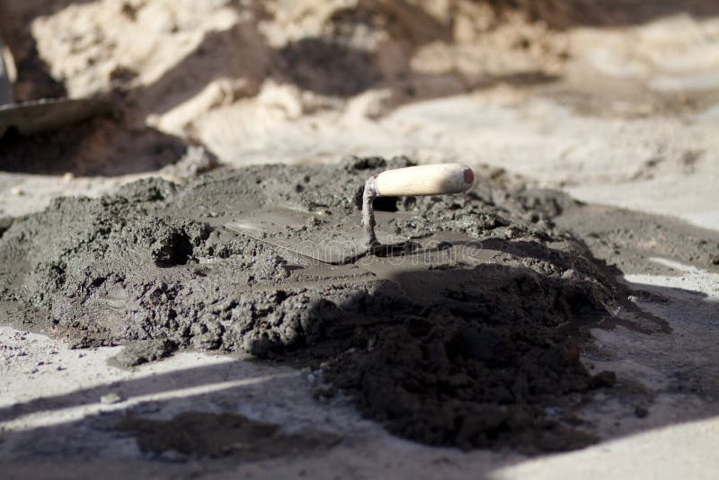 Trowel in the concrete stock image. Image of metal, sand - 34822969