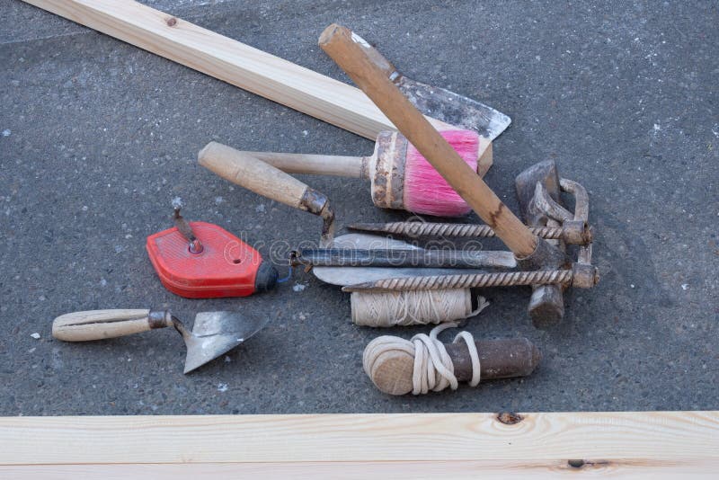 Various Masonry and Brickwork Tools Being Used on a Construction Site ...