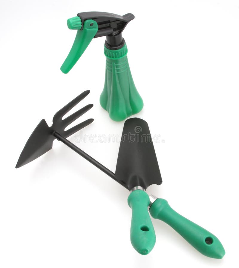 Trowel Cutivator and Sprayer Stock Photo - Image of shovel, plant: 4594874