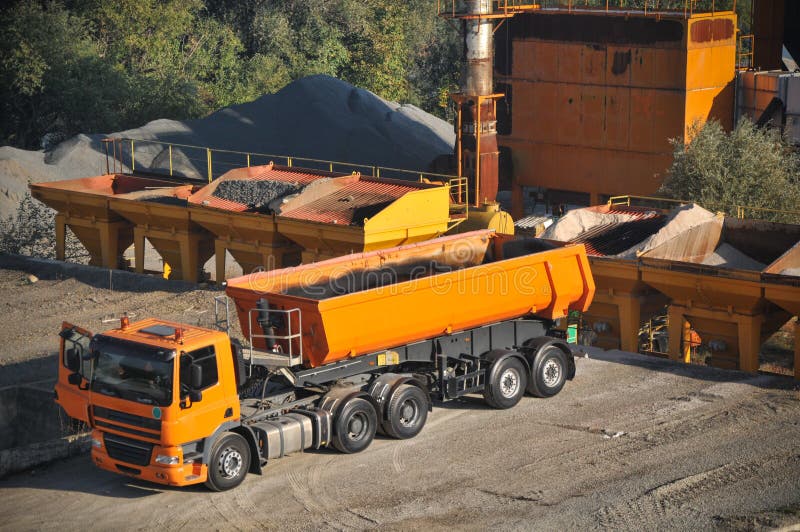 Truck on the asphalt plant stock image. Image of hill - 27034273
